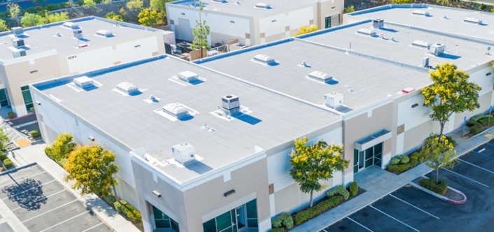 Flat Roof Systems for Commercial Buildings - A Complete Guide