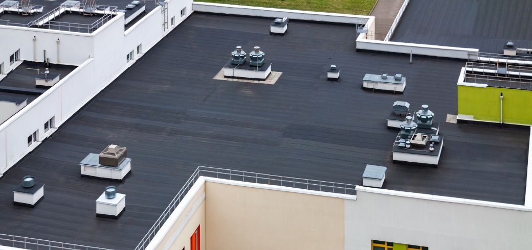 Types of Commercial Flat Roofs - 14 Top Roofing Solutions